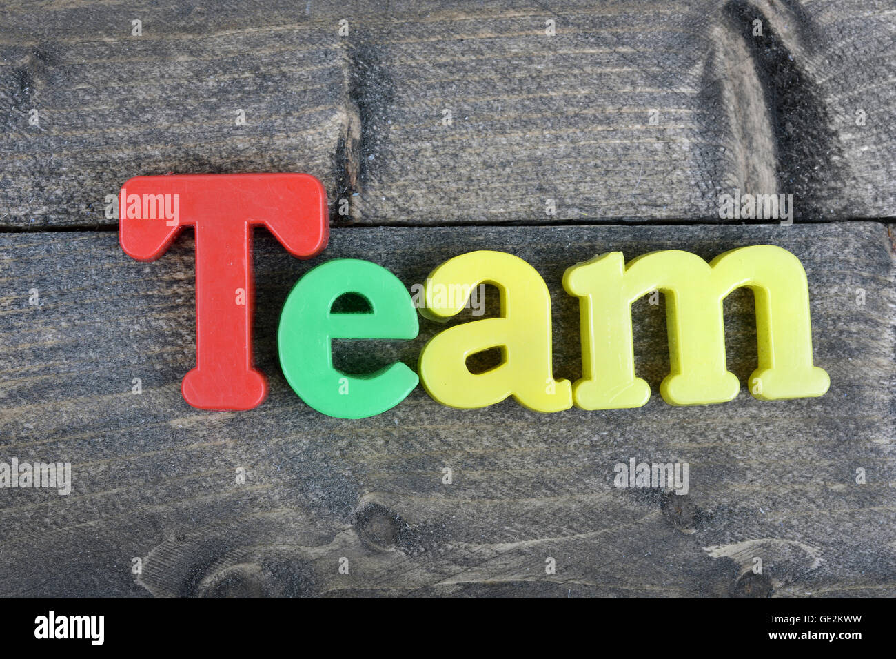 Team word on wooden table Stock Photo - Alamy