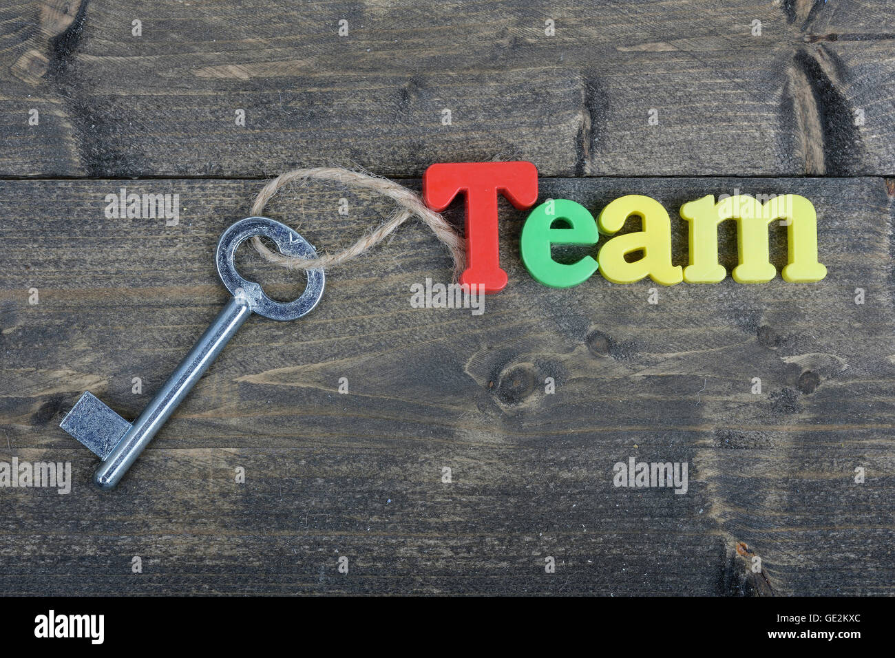 Team word on wooden table Stock Photo - Alamy
