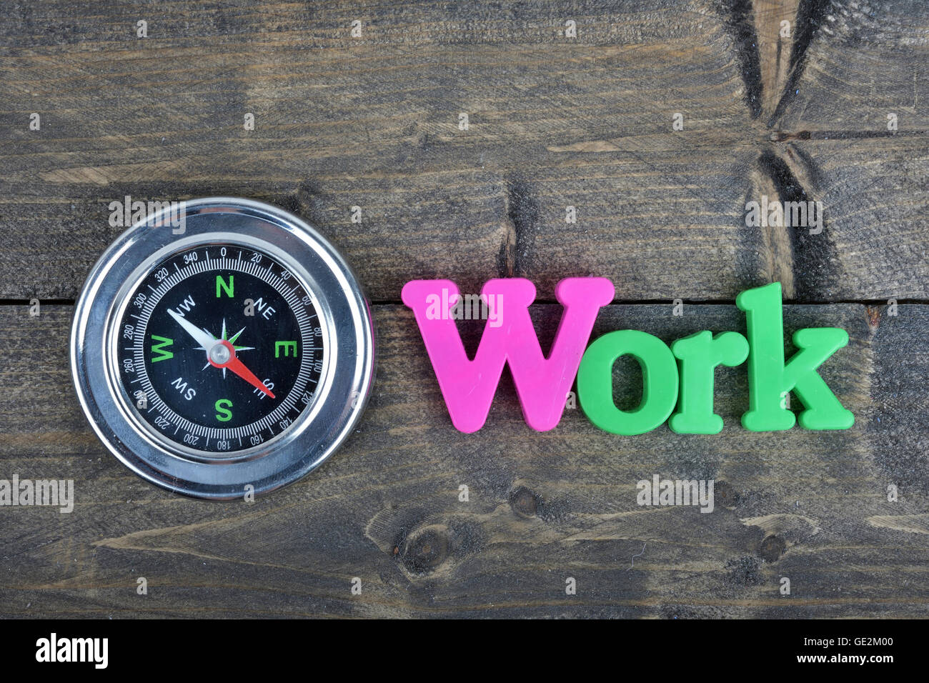 Work word on wooden table Stock Photo - Alamy