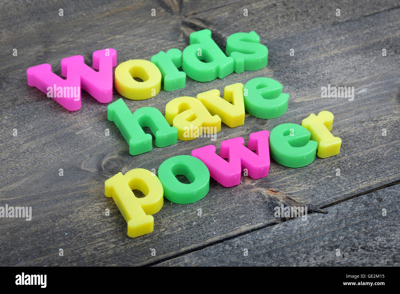 Words have power word on wooden table Stock Photo - Alamy