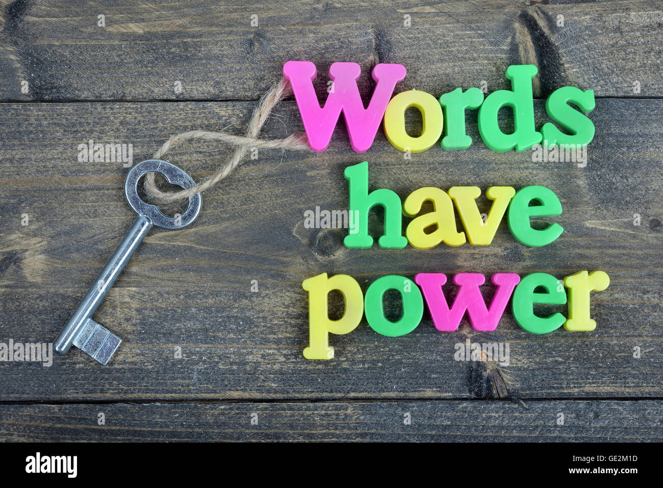 Words have power word on wooden table Stock Photo - Alamy