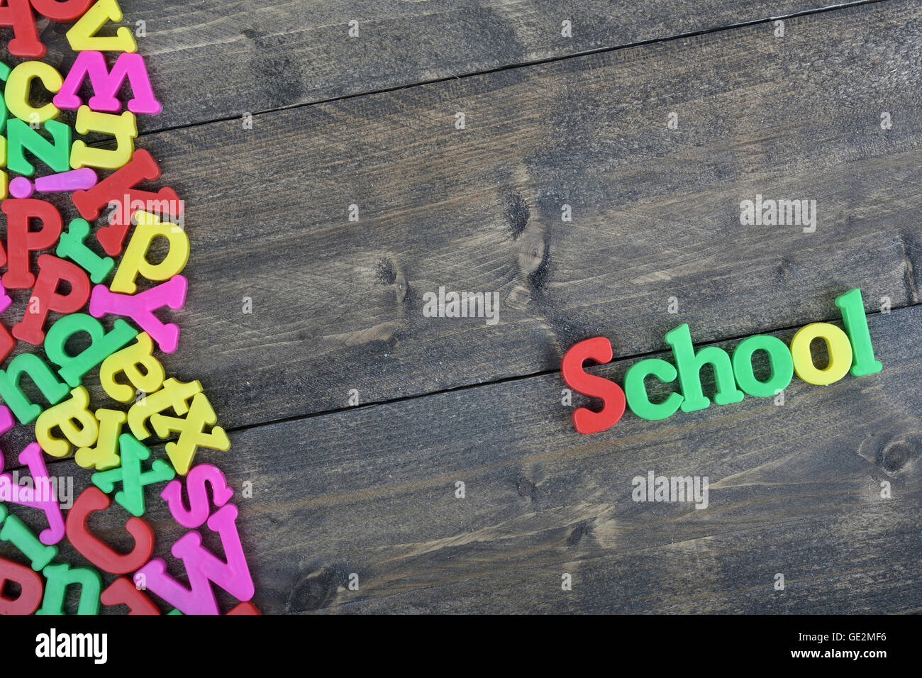 School word on wooden table Stock Photo - Alamy