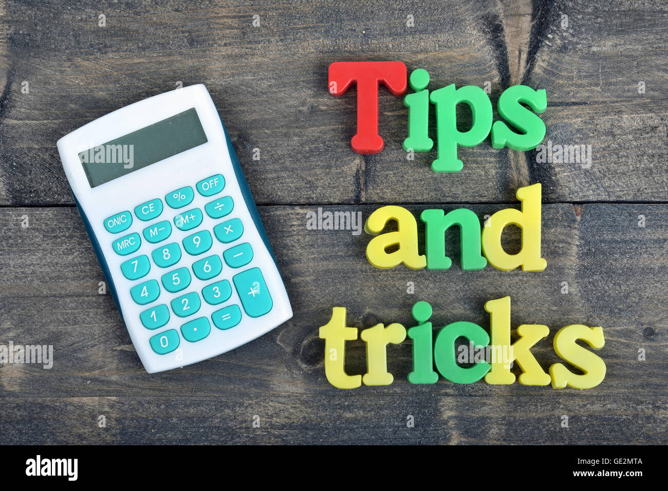 Tips and tricks word on wooden table Stock Photo - Alamy