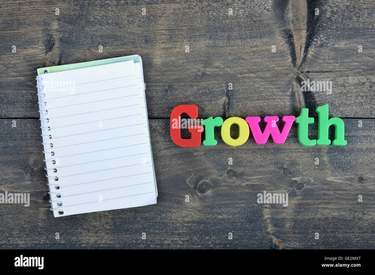 Growth word on wooden table Stock Photo - Alamy