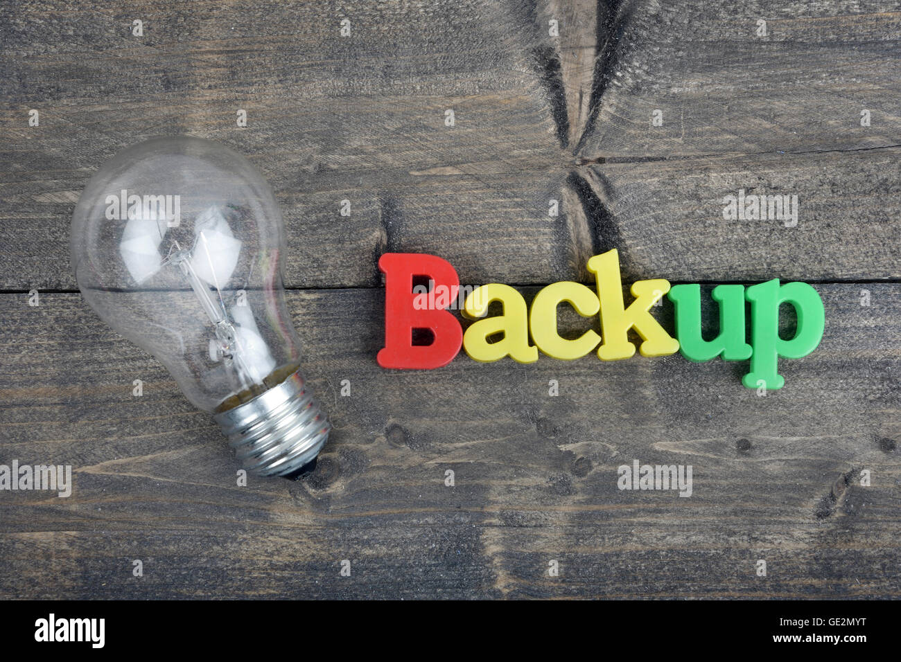 Backup word on wooden table Stock Photo - Alamy