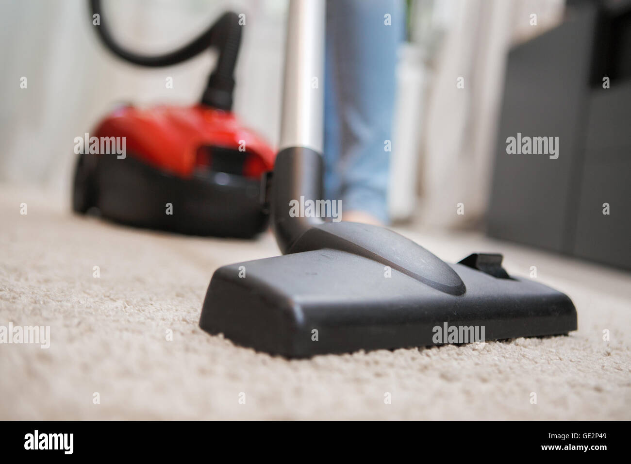 Black vacuum cleaner brush closeup. Carpet cleaning indoor Stock Photo ...