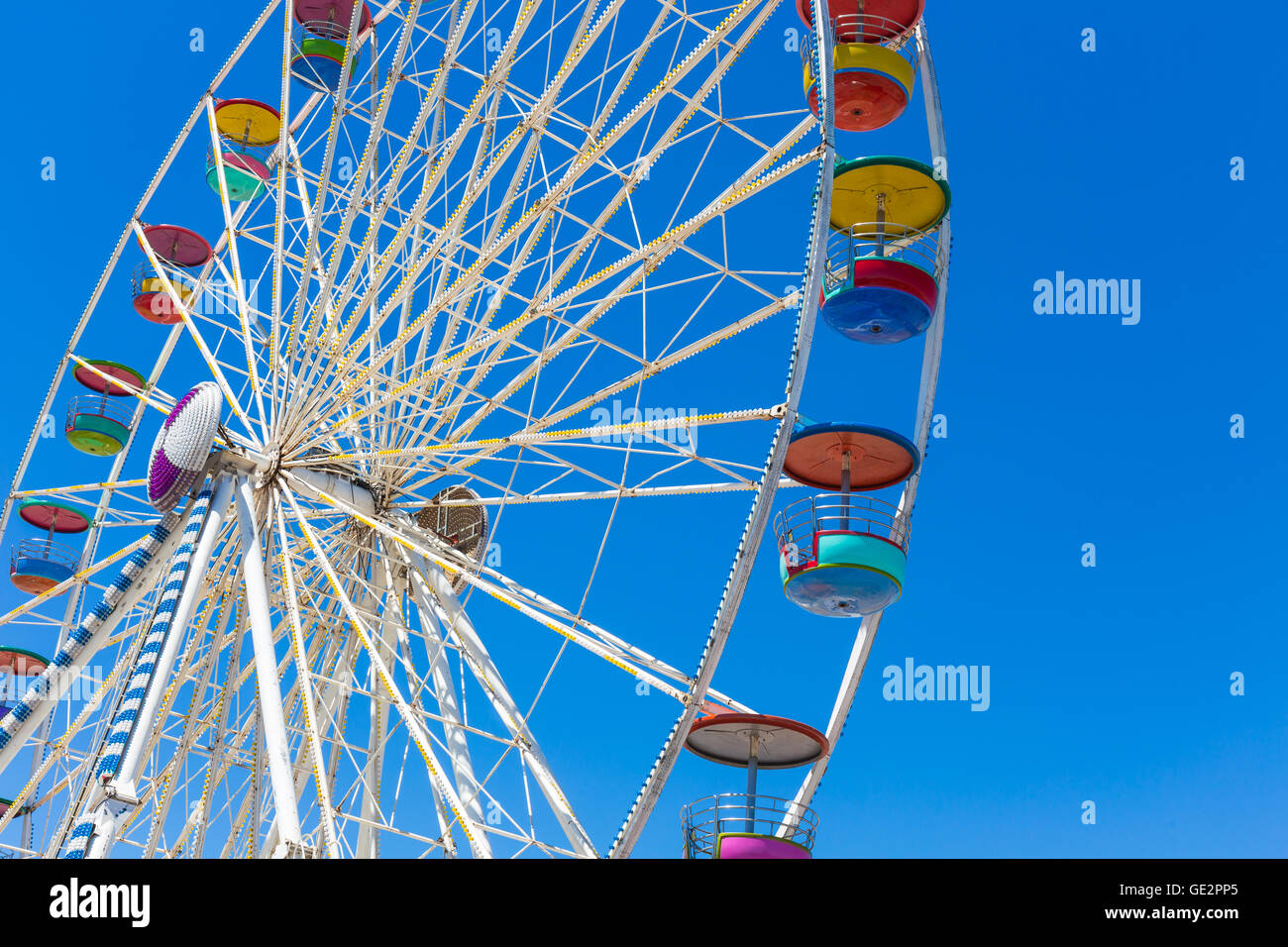 Giant ferris wheel in Amusement park with blue sky background Stock ...