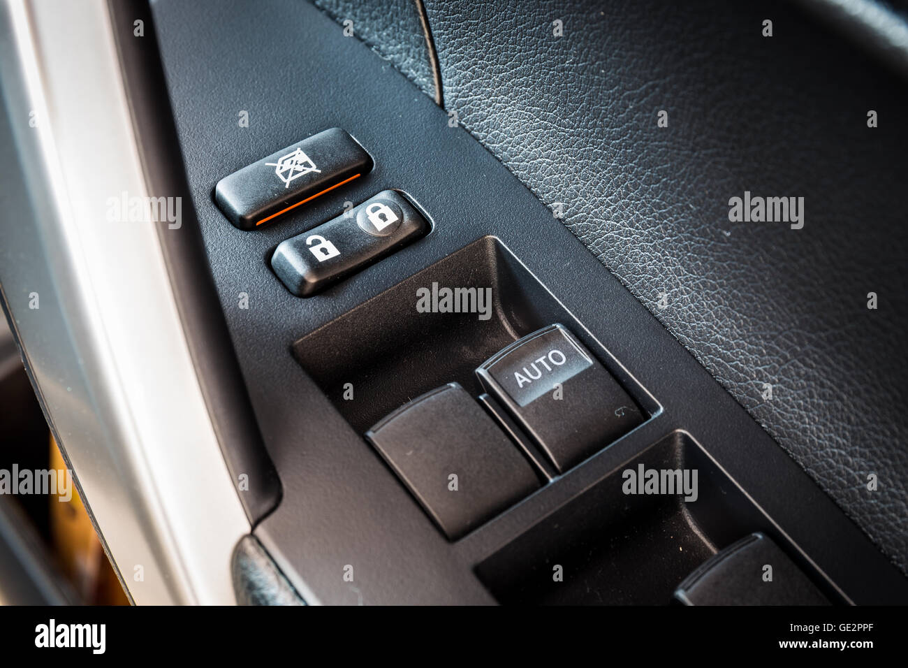 Car window control and adjustment buttons. Focus lock and unlock button ...