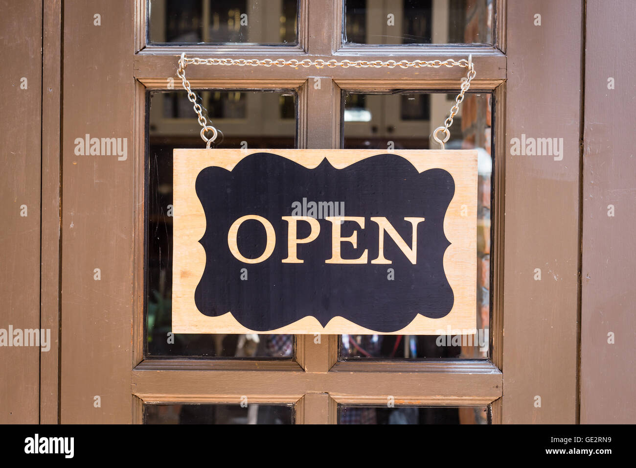 Hanging sign chain hi-res stock photography and images - Alamy