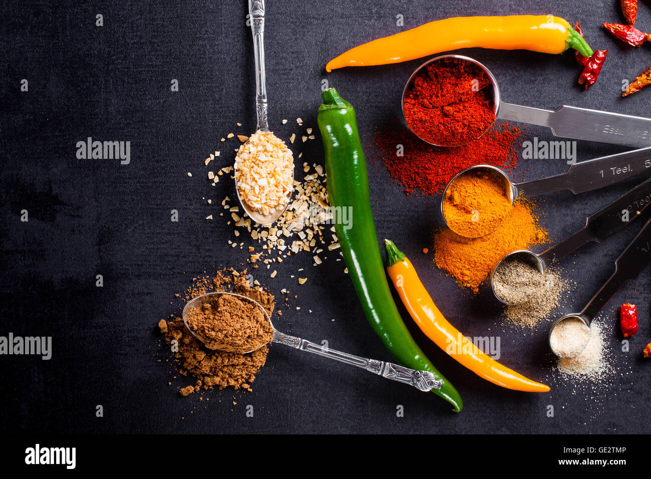 Colored paprika and spices in scoop Stock Photo - Alamy