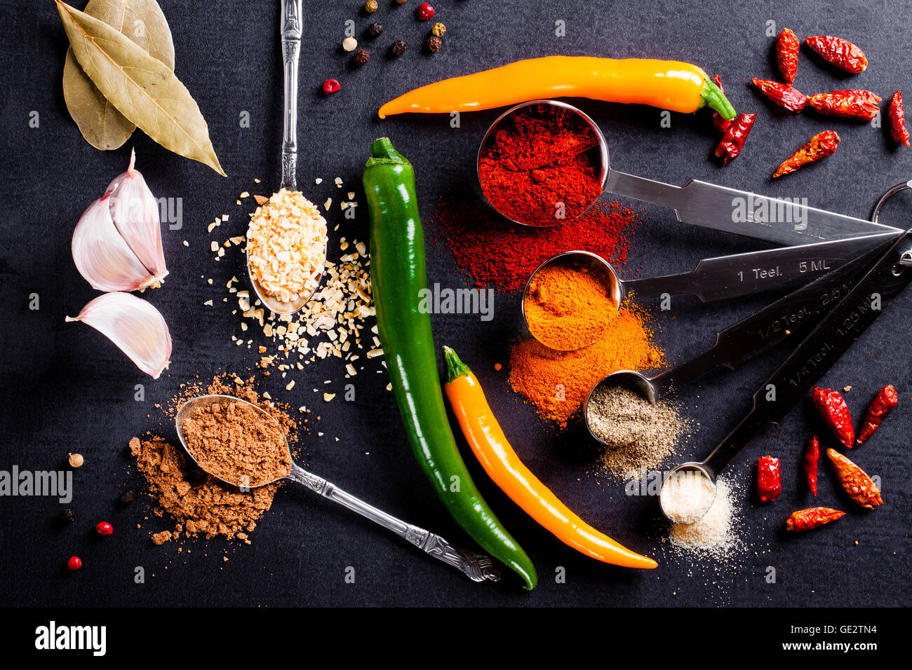 Colored paprika and spices in scoop Stock Photo - Alamy