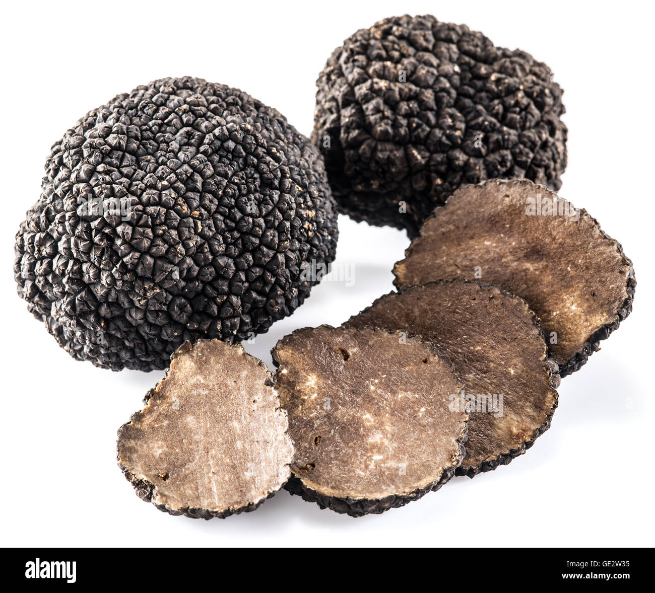 Black truffles isolated on a white background Stock Photo - Alamy