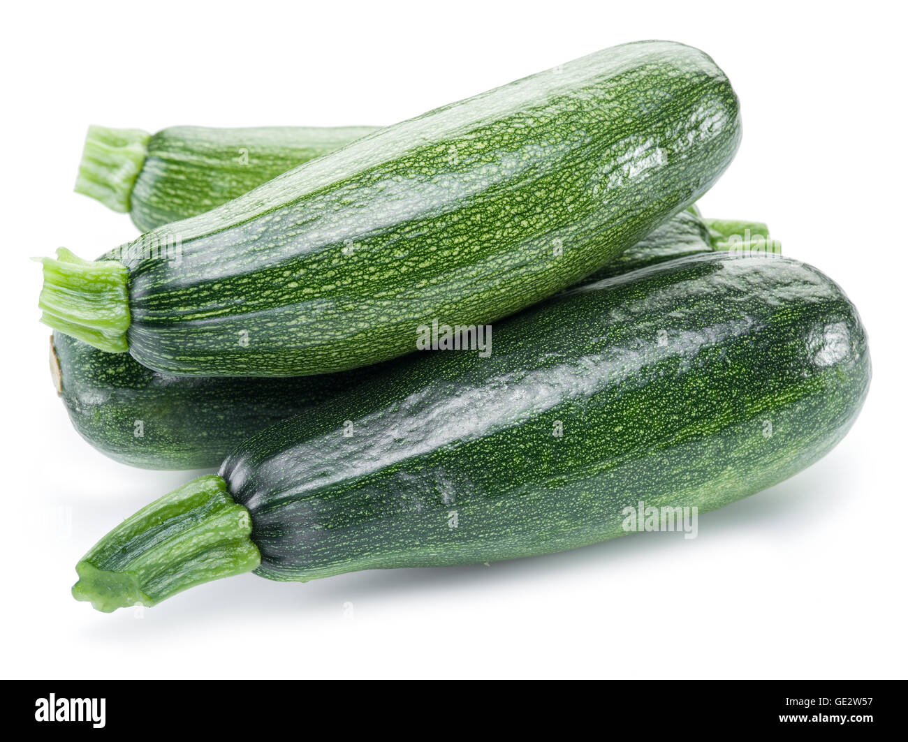 Zucchini on a white background Stock Photo - Alamy