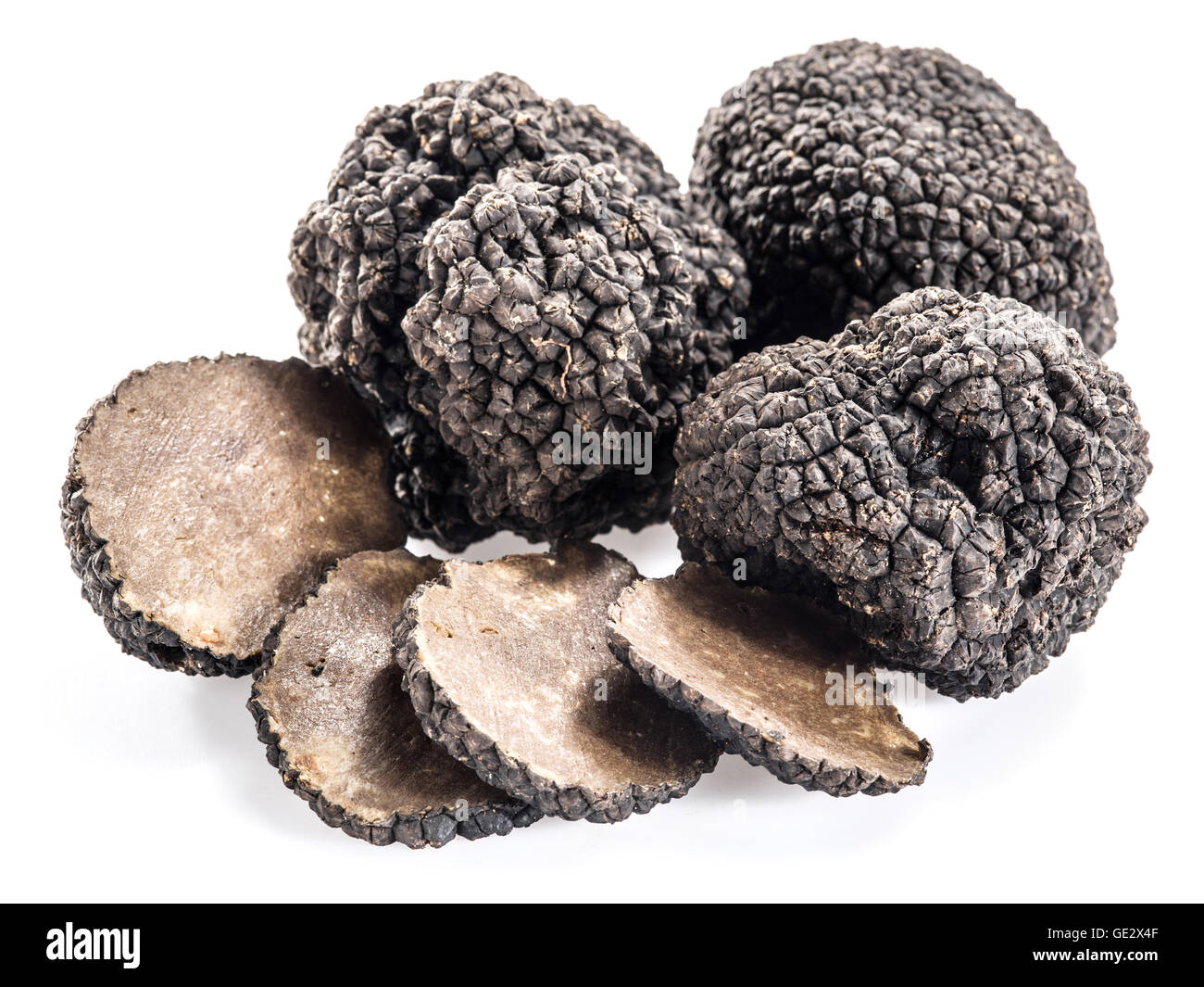 Black truffles isolated on a white background Stock Photo - Alamy