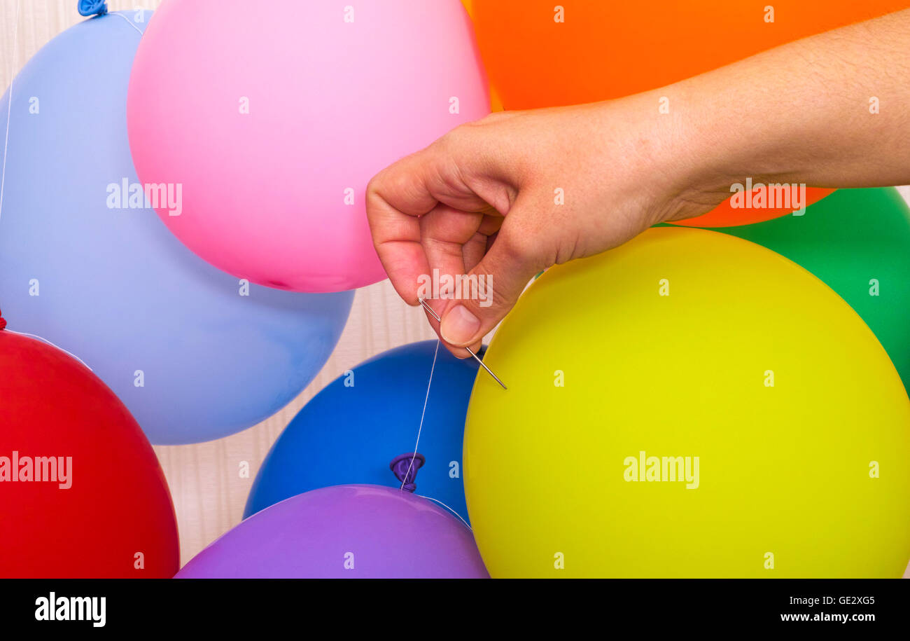 Woman balloon pop hi-res stock photography and images - Alamy