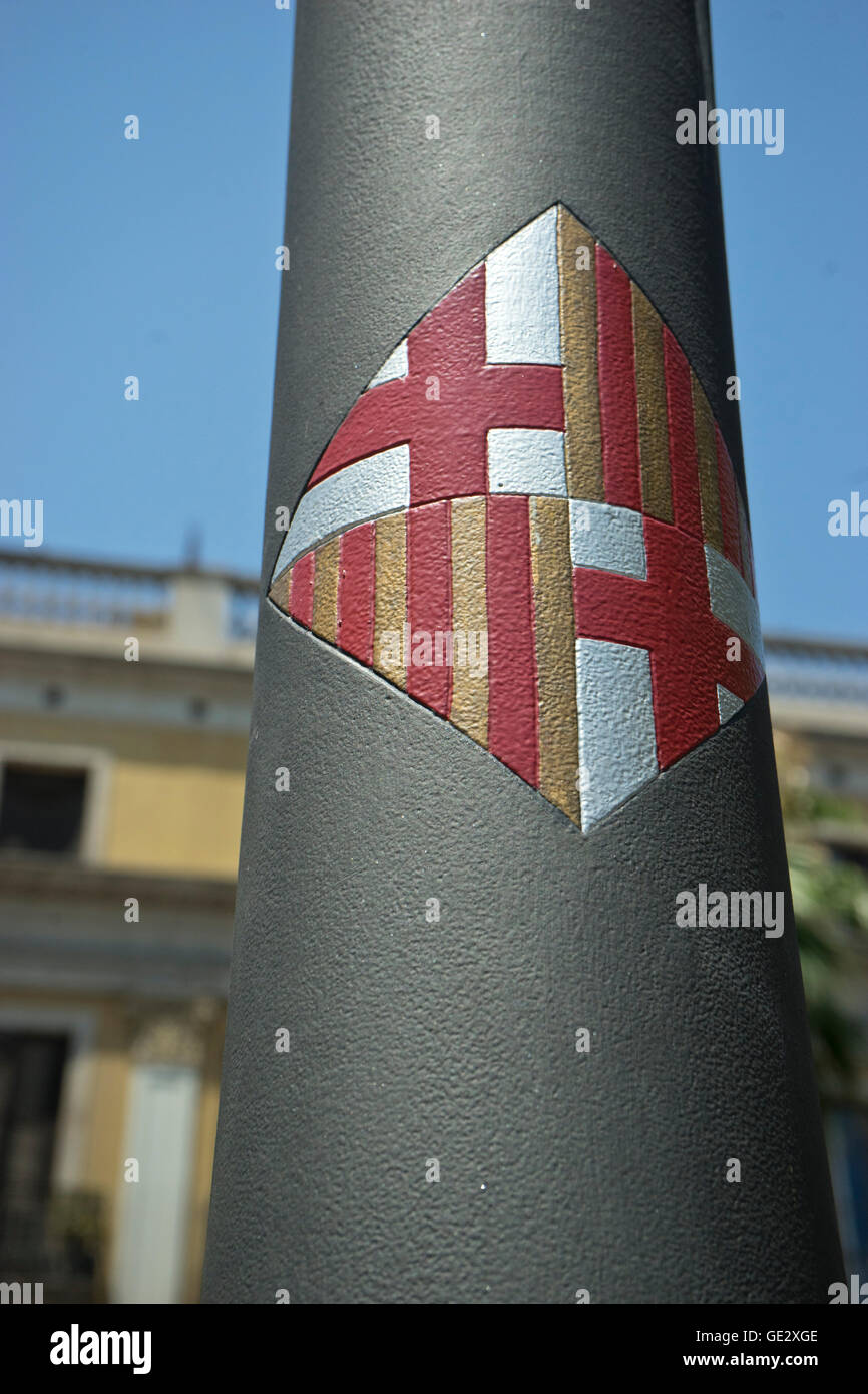 A Catalonian coat of arms on a column in the old Gothic quarter in ...