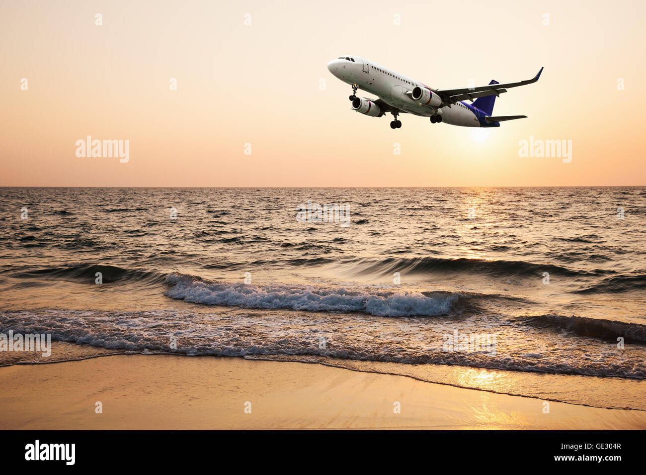 Plane sunset beach hi-res stock photography and images - Alamy