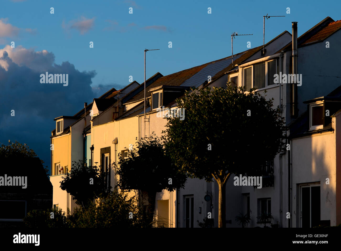 Houses / holiday homes in Haverigg, Cumbria at dusk Stock Photo - Alamy