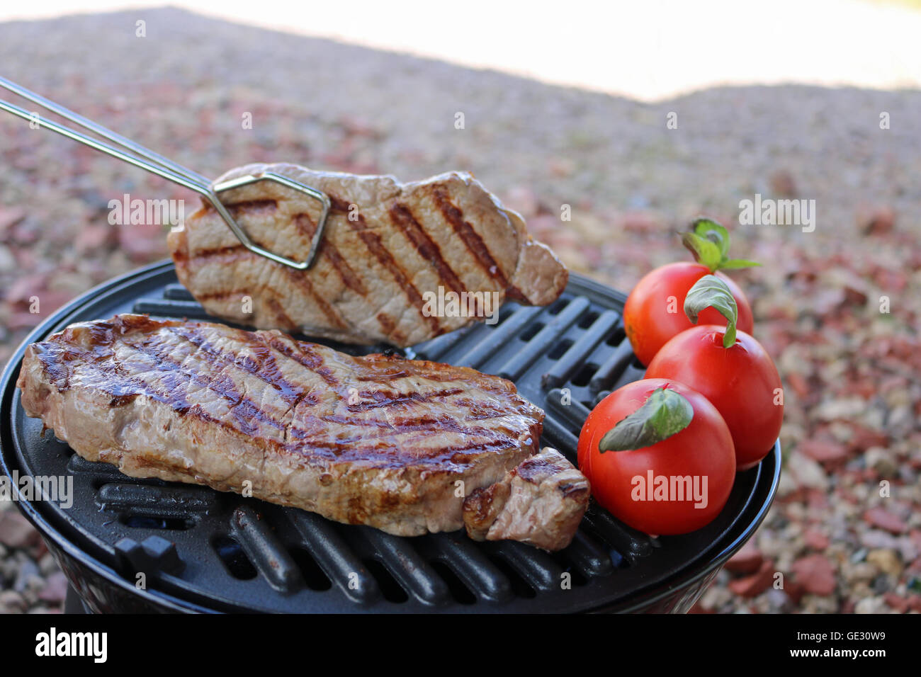 Outdoor barbecue steaks hi-res stock photography and images - Alamy