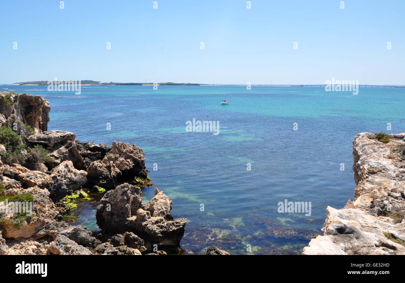 Turquoise Indian Ocean seascape with rugged coastal limestone rock ...
