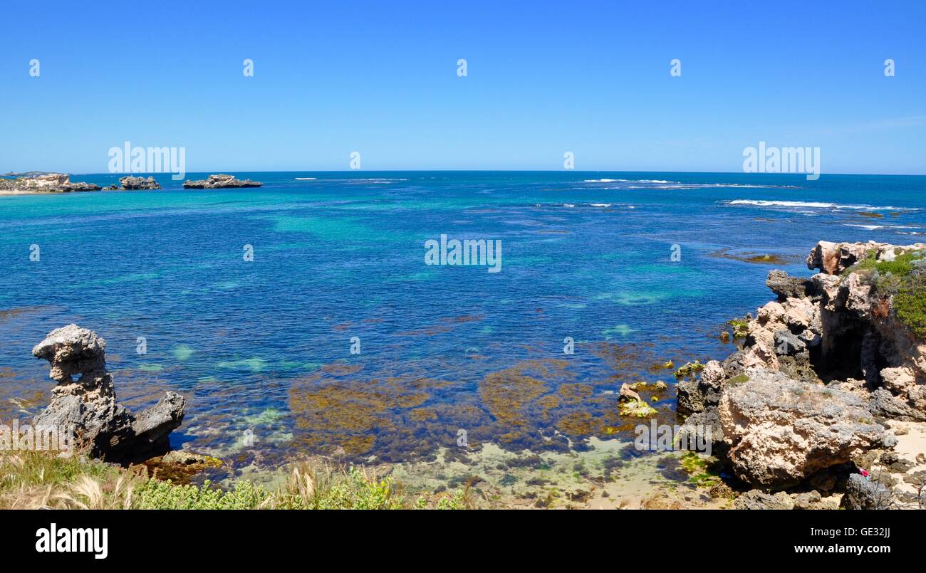 Peaceful Indian Ocean seascape with coastal limestone and beach reef at ...