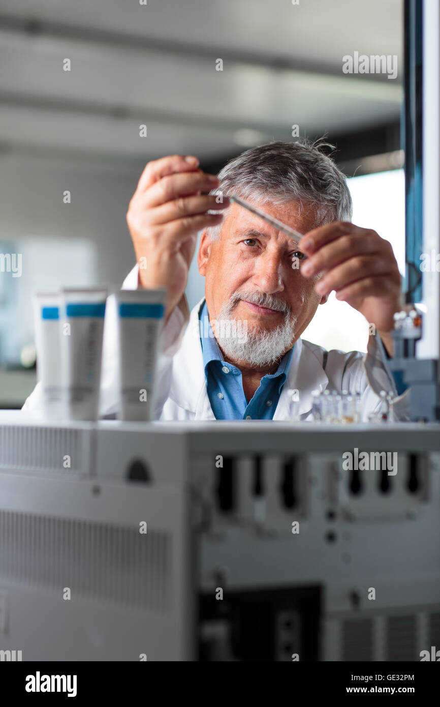 Senior chemistry professor/doctor in a lab (color toned image Stock ...