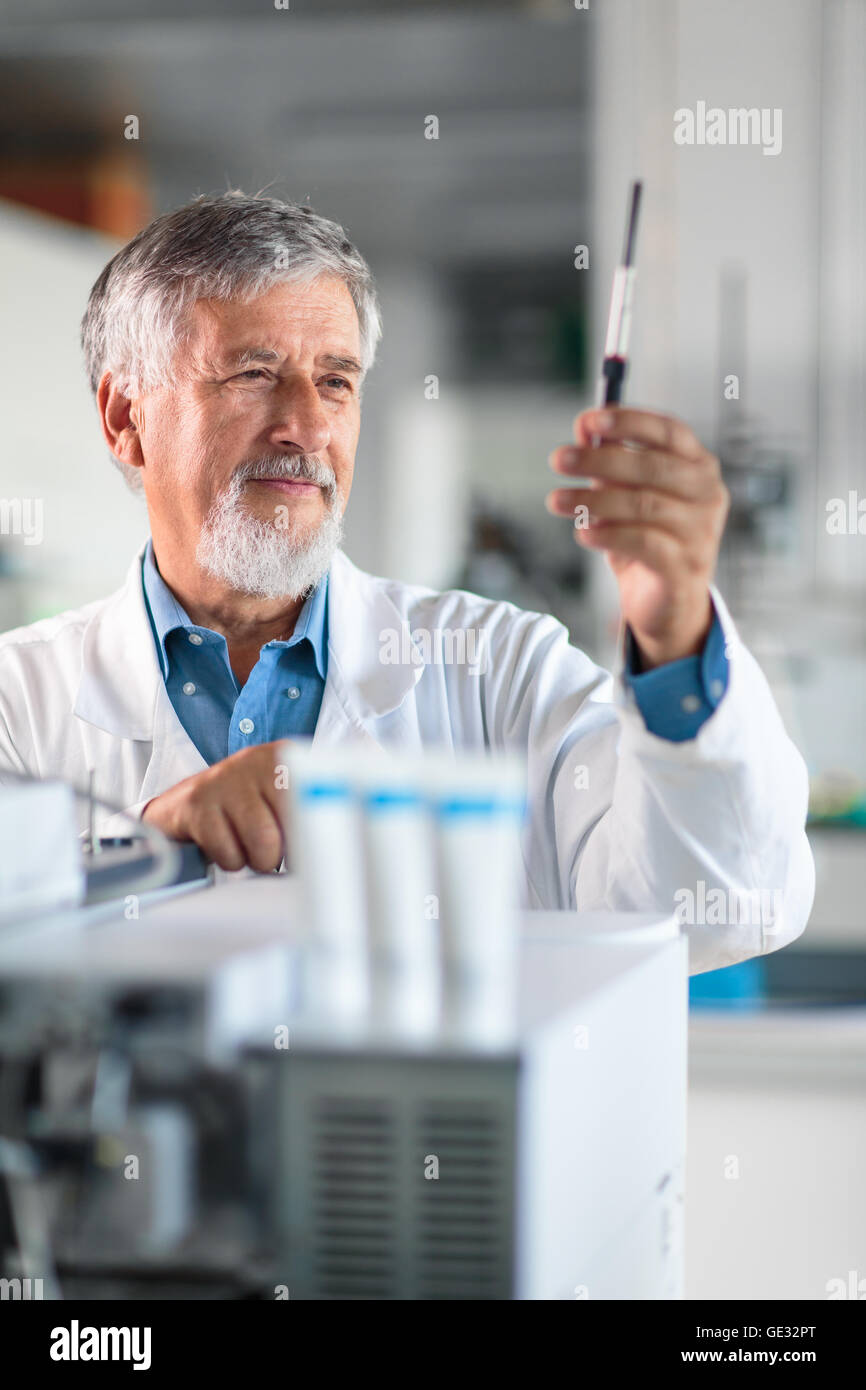 Senior chemistry professor/doctor in a lab (color toned image Stock ...