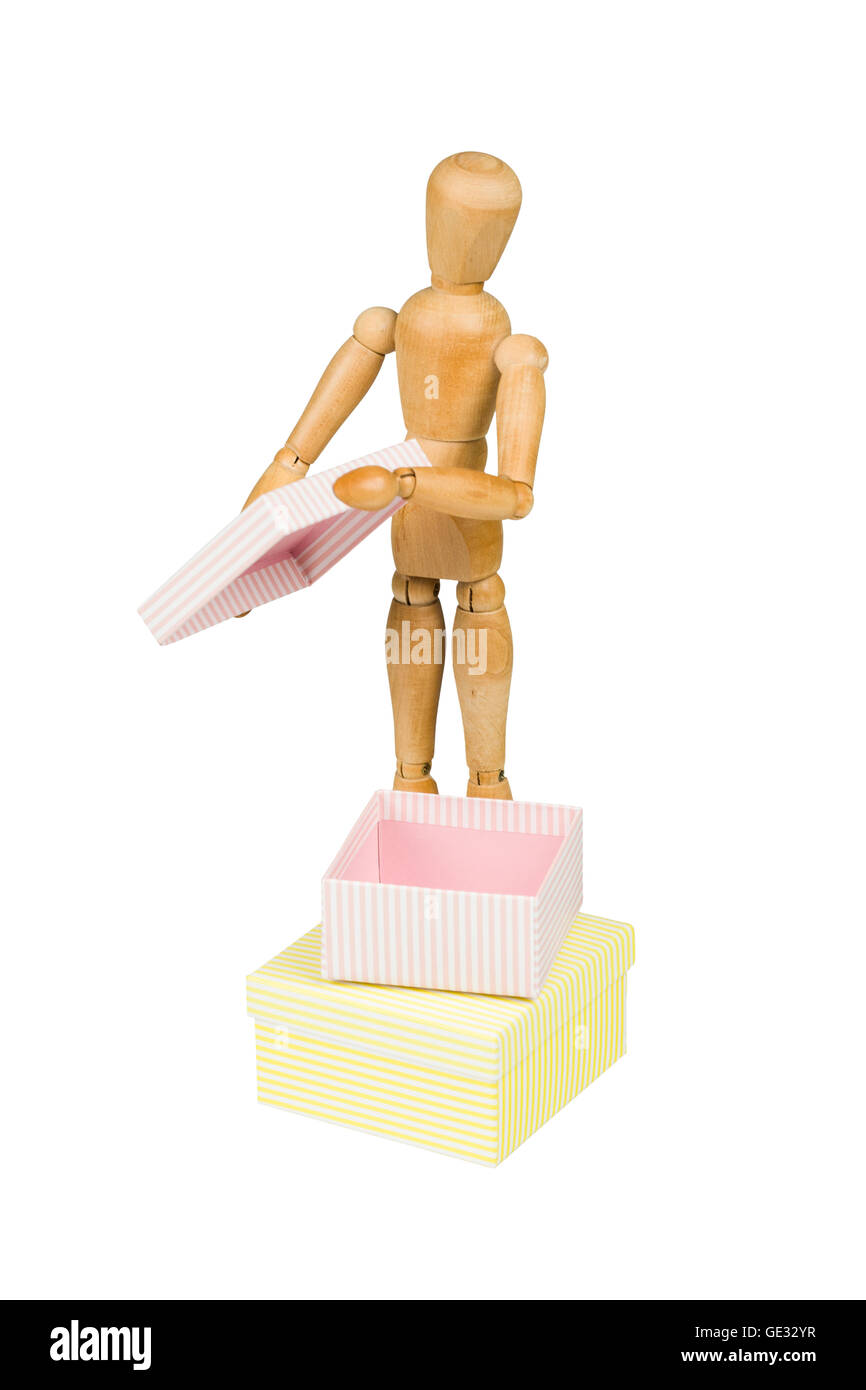 Wooden mannequin opens little box Stock Photo - Alamy