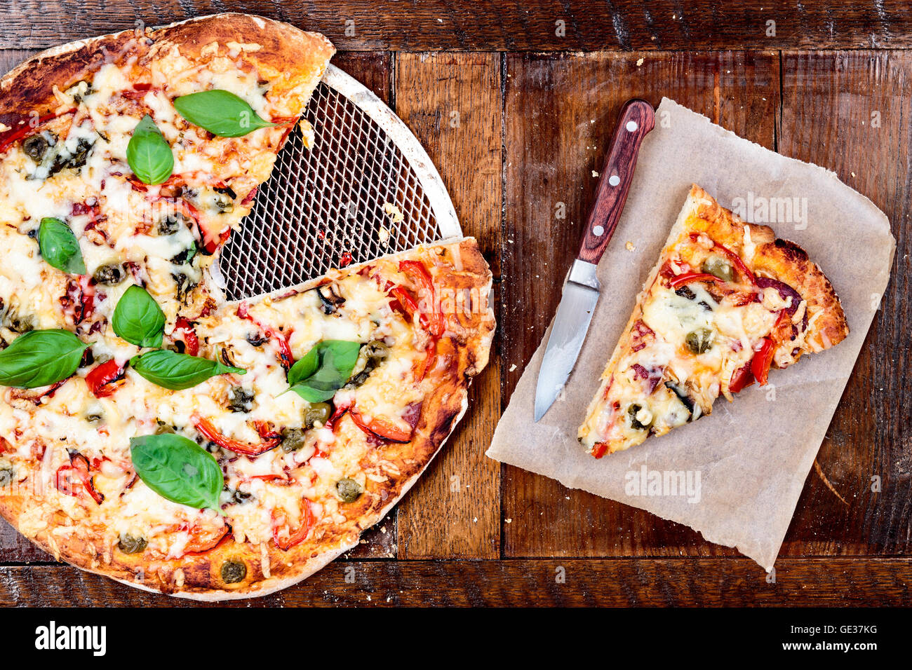 Pizza on a table Stock Photo - Alamy