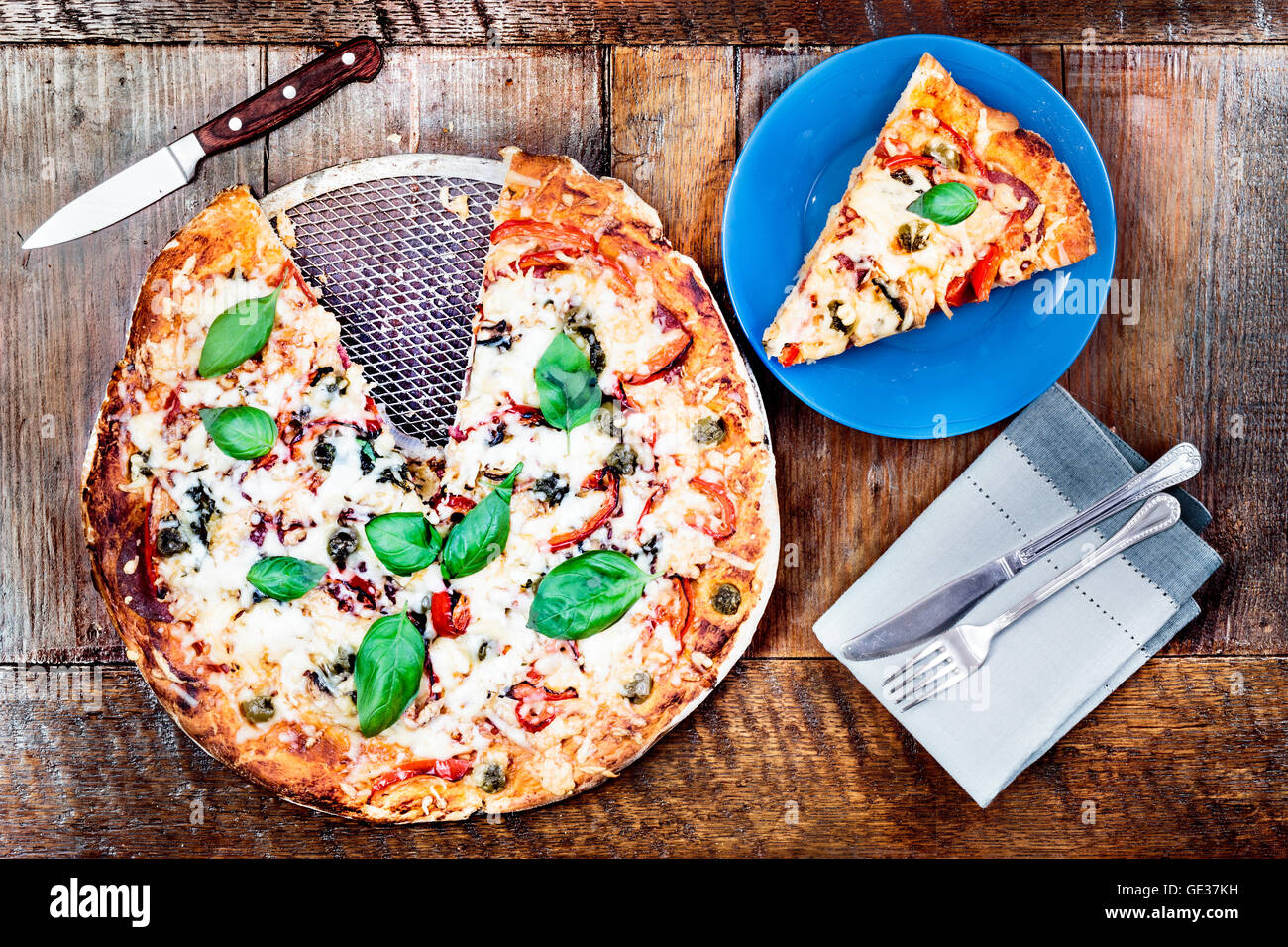 Pizza on a table Stock Photo - Alamy