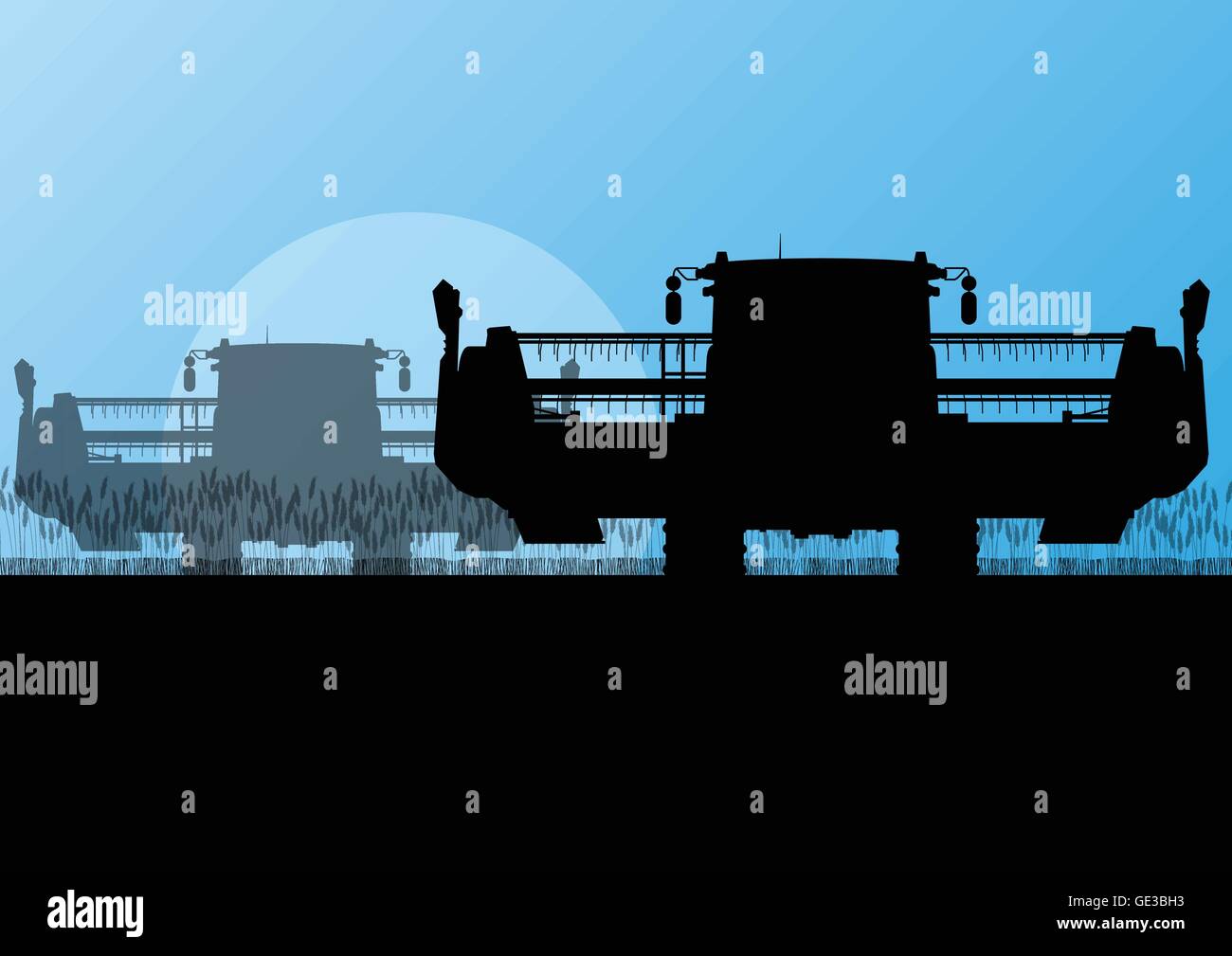 Agricultural combine harvester in grain field seasonal farming ...
