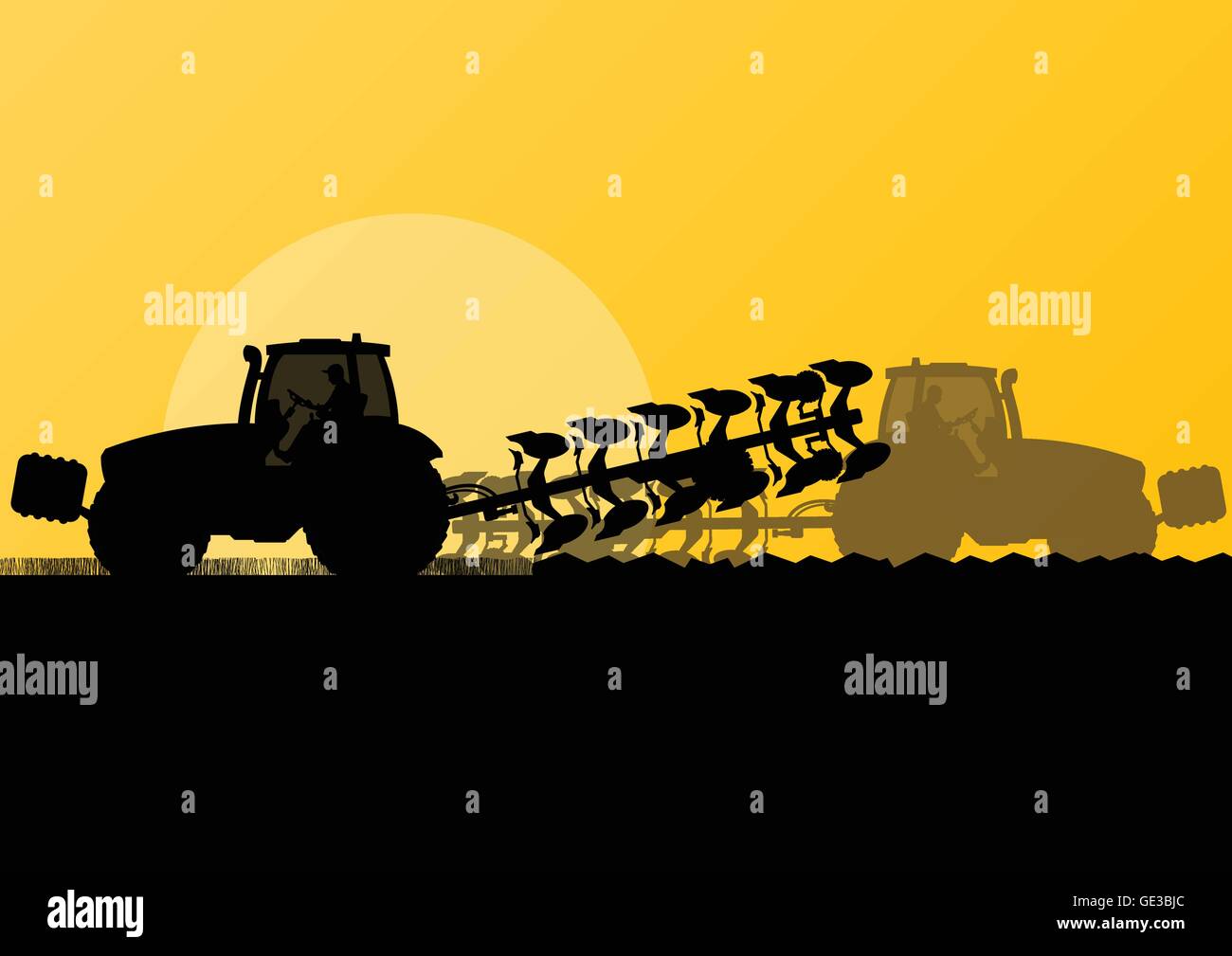 Agriculture tractor plowing the land in cultivated country grain field ...