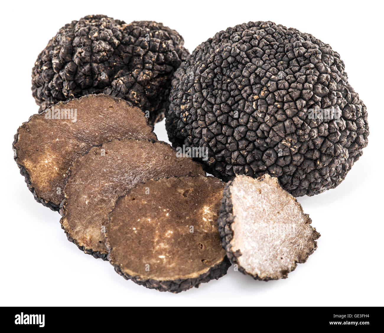 Black truffles isolated on a white background Stock Photo - Alamy