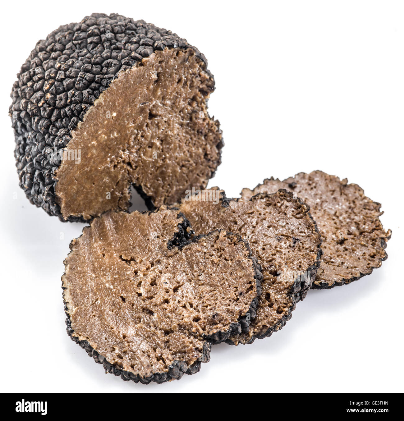 Black truffles isolated on a white background Stock Photo - Alamy