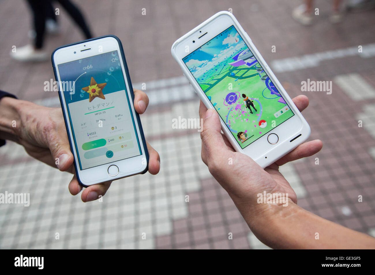 Tokyo, Japan. 22nd July, 2016. Fans try out Pokemon Go in Tokyo's ...