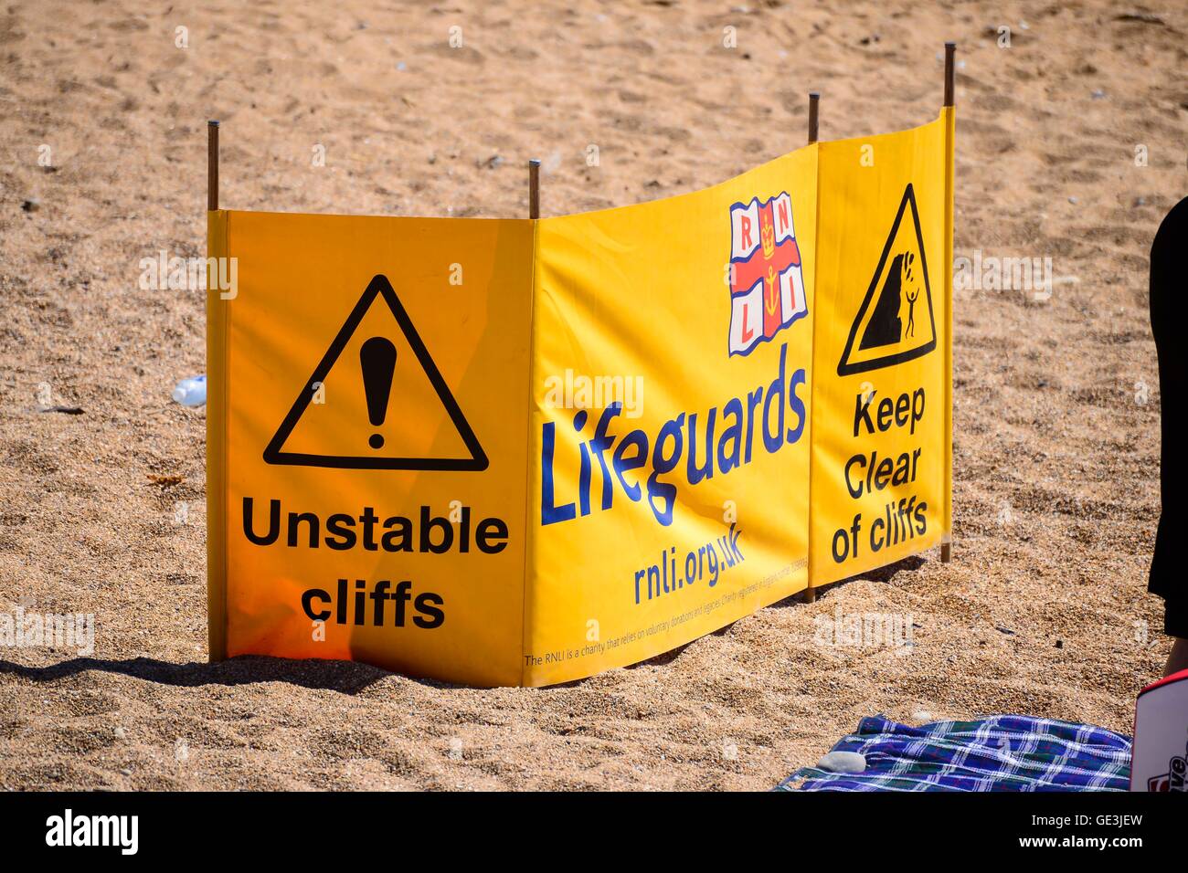 West Bay, Dorset, UK. 22nd July 2016. Unstable Cliffs sign warning of ...