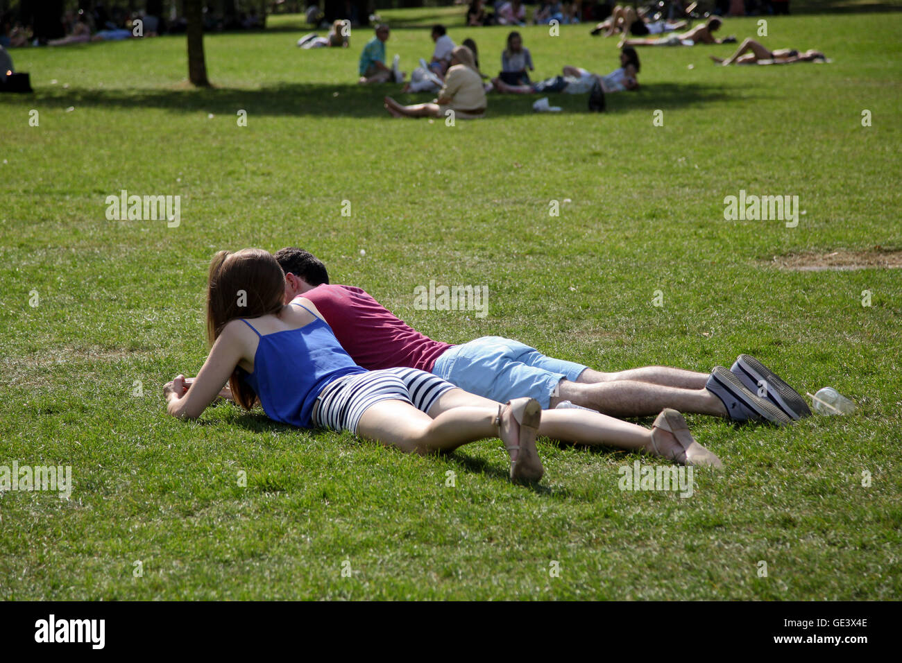 London, UK. 23rd July, 2016. People enjoy the sun in St James Park as ...