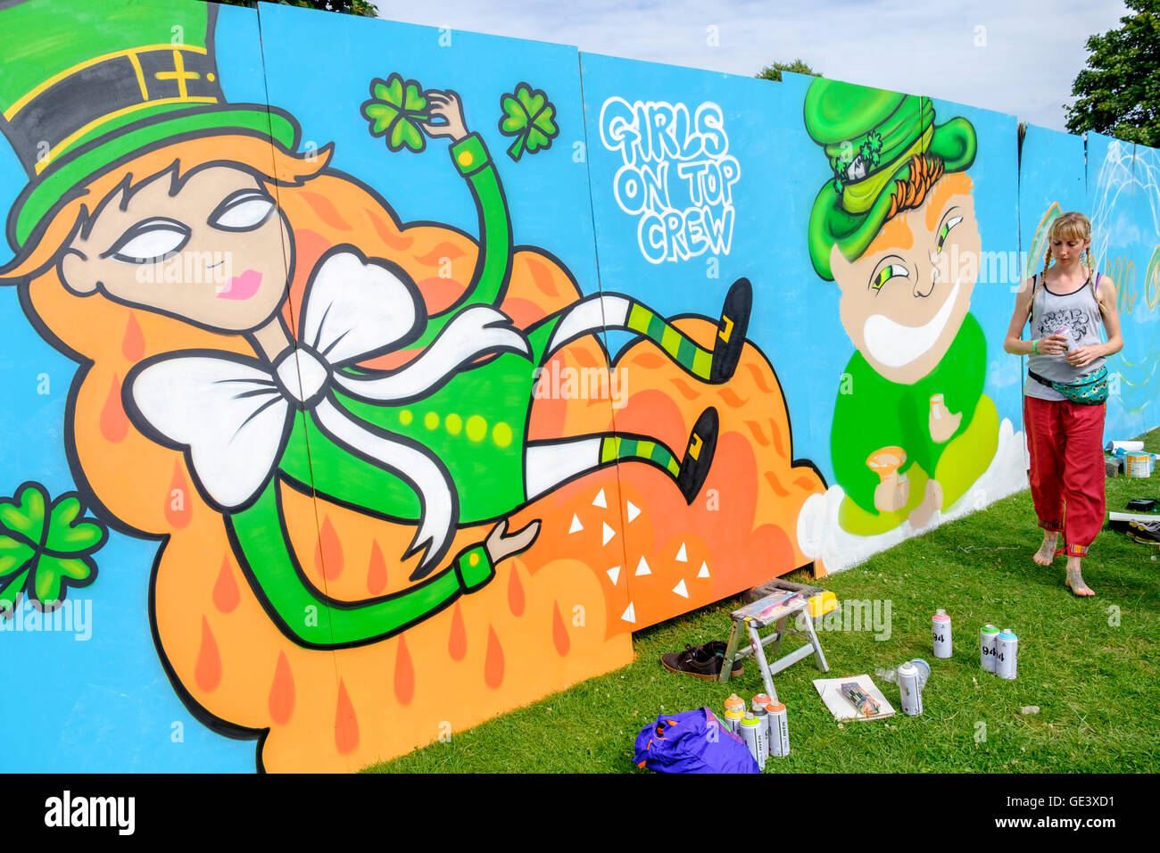 Bristol, UK, 23rd July, 2016. An artist is pictured in South Street ...