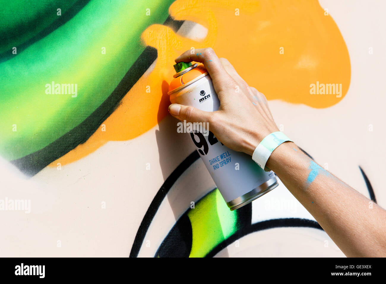 Bristol, UK, 23rd July, 2016. An artist is pictured in South Street ...