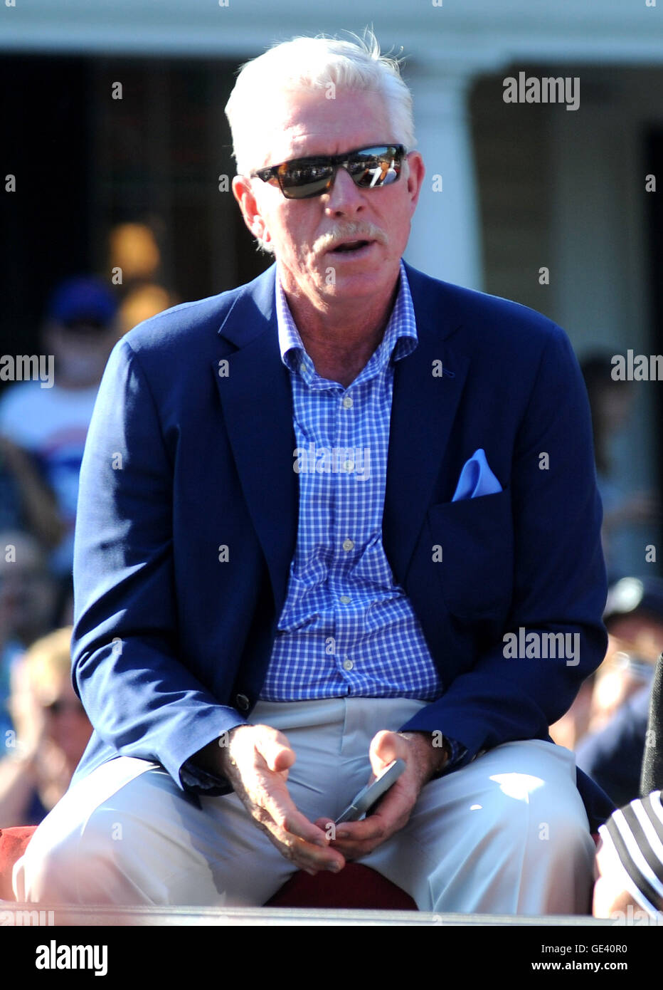 New York, USA. July 23, 2016. Mike Schmidt rides on the back of a Ford ...