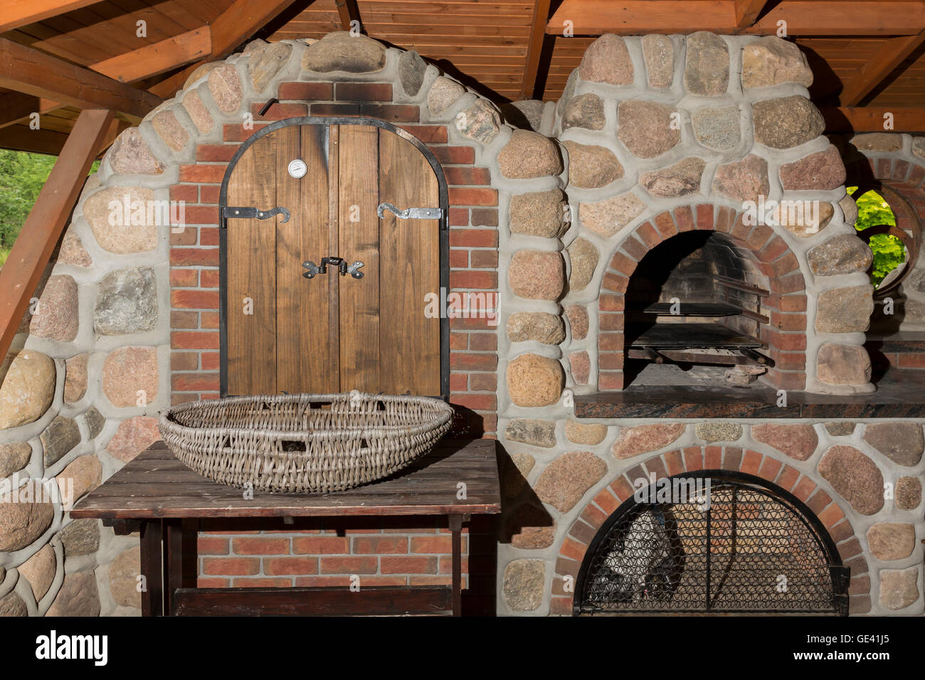Old grill- smokehouse made from the stones Stock Photo - Alamy