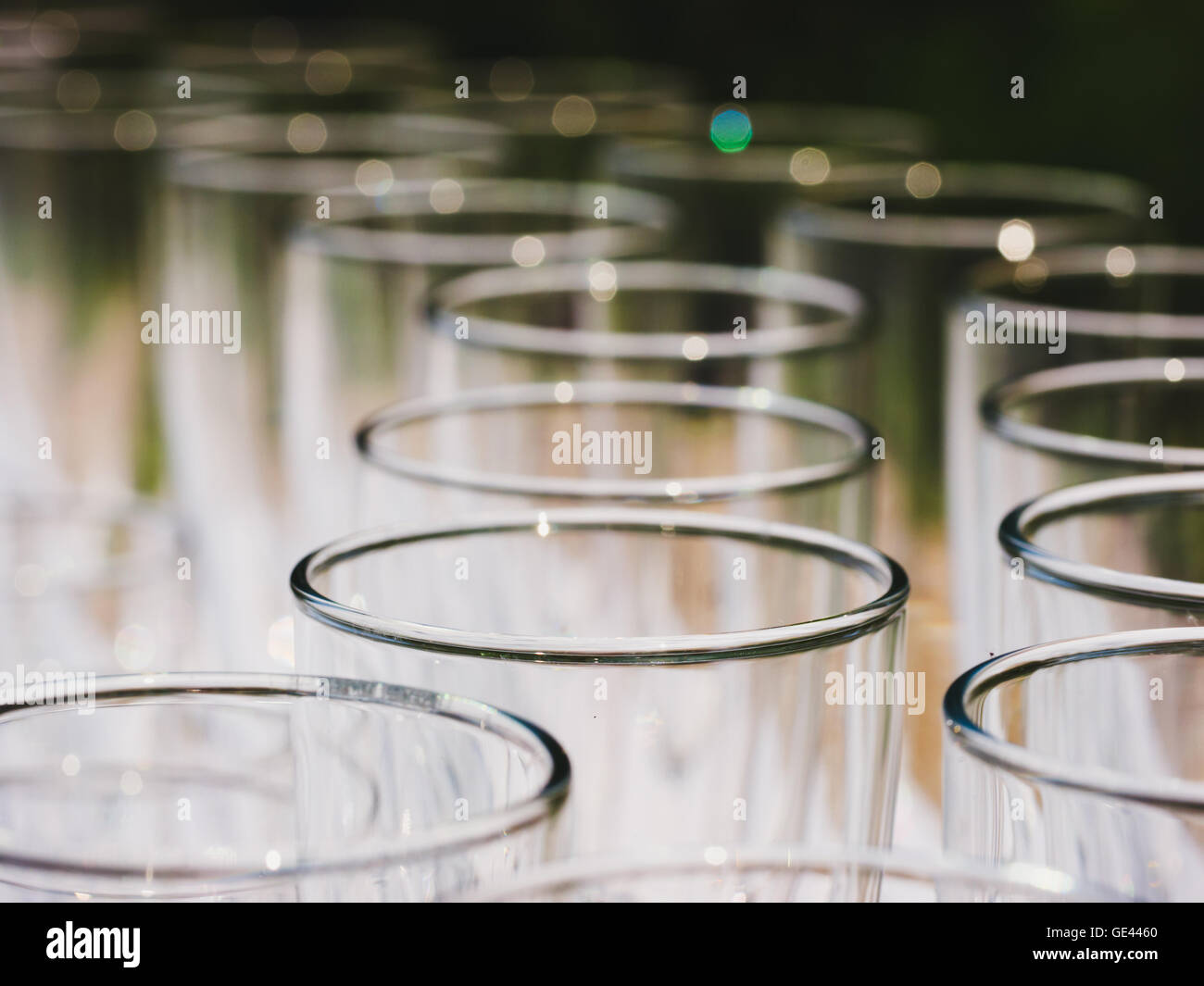 Empty glasses on a banquet table close up Stock Photo - Alamy