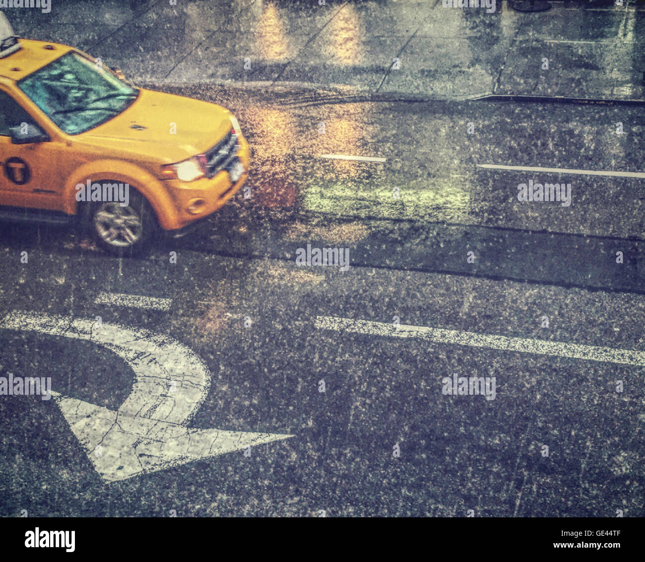 Rain Soaked City Street with Traffic Directional Turn Arrow, NYC, USA ...