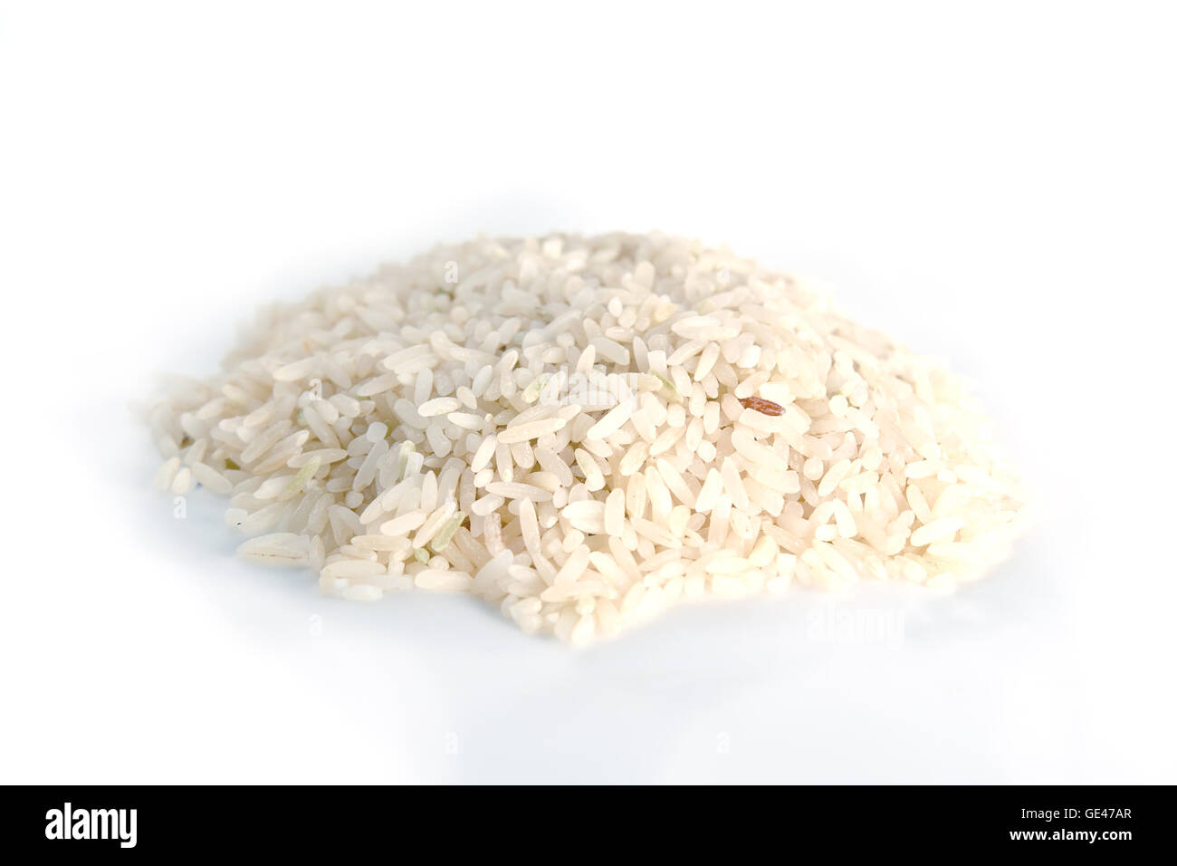 Heap of natural rice isolated on white background Stock Photo - Alamy