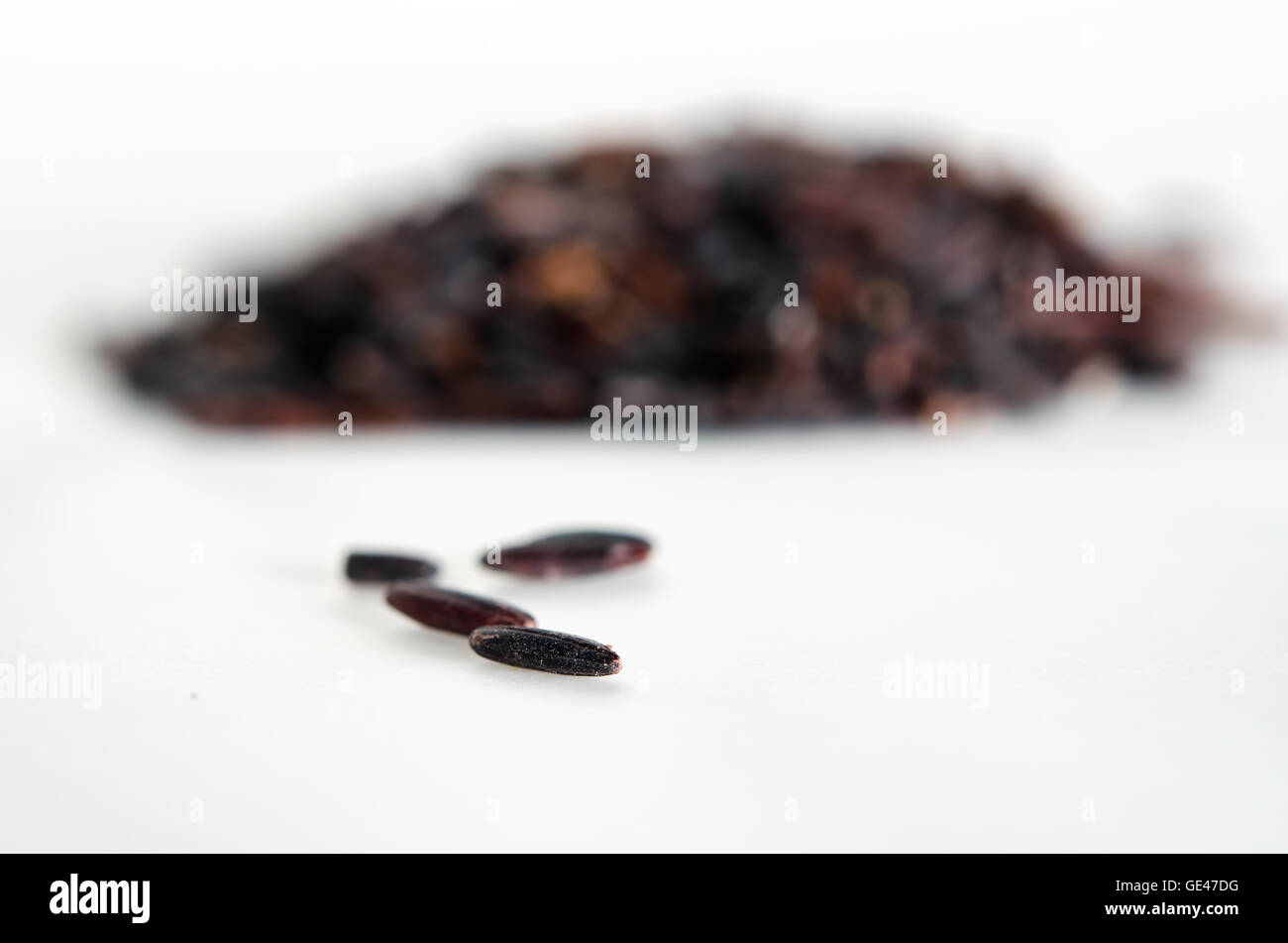 Piles of raw rice berry rice isolated on white background Stock Photo ...