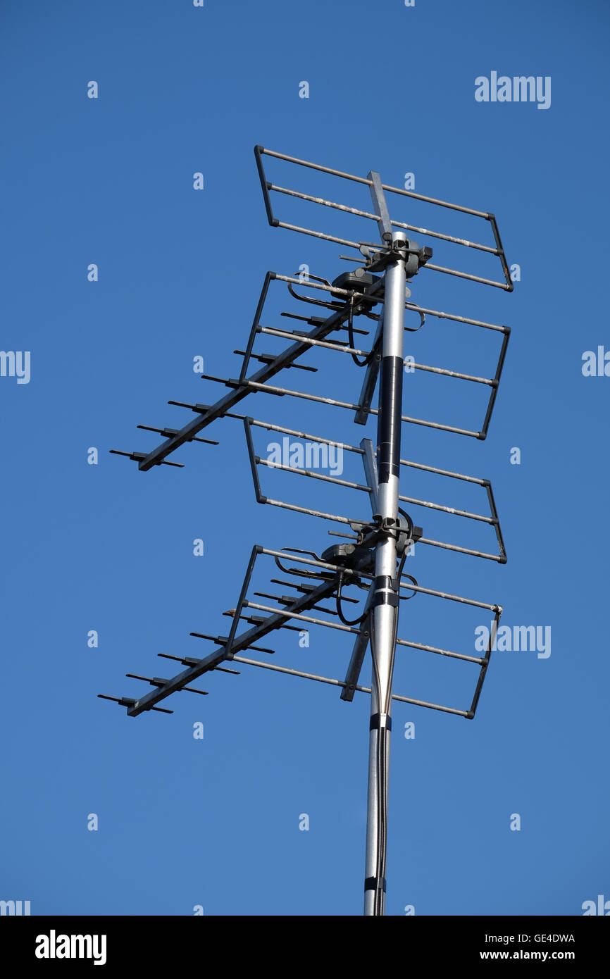 two television aerials on the roof Stock Photo - Alamy