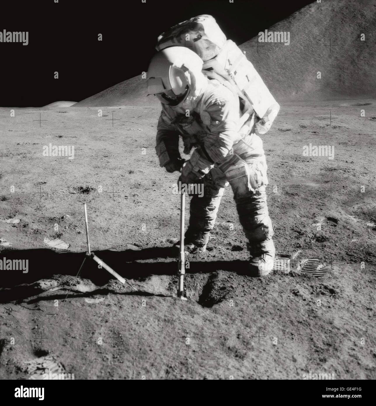 Astronaut James Irwin scoops up soil samples during the Apollo 15 ...