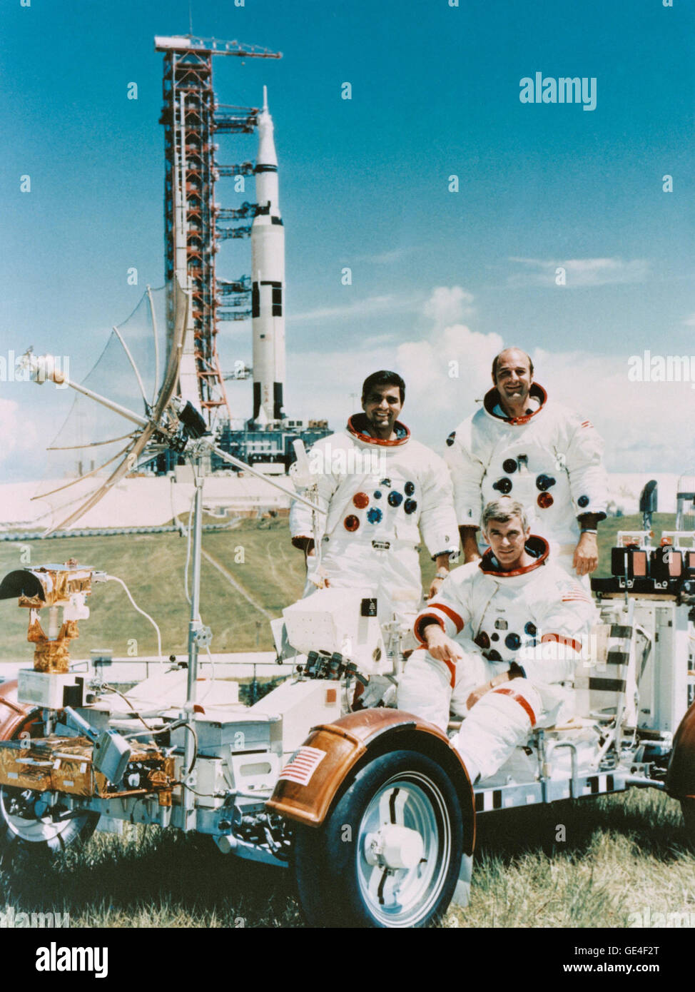 The Apollo 17 prime crew is pictured with a Lunar Roving vehicle trainer, part of their ...