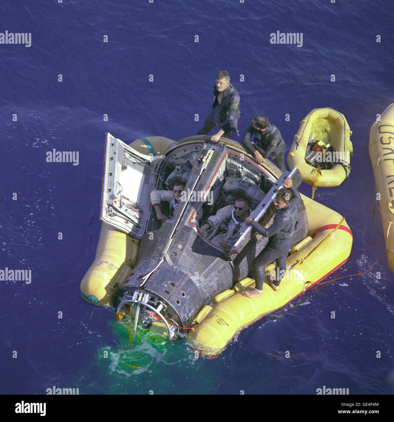 Astronauts Neil Armstrong and David Scott pose with the hatches open on ...