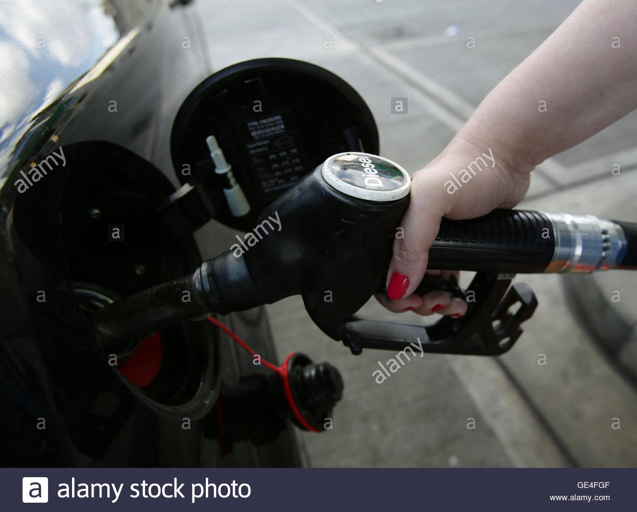 Petrol Pump Uk Filling Up High Resolution Stock Photography and Images ...